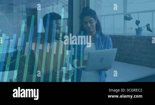 Woman opening laptop and angling screen toward man, reviewing bar chart ...