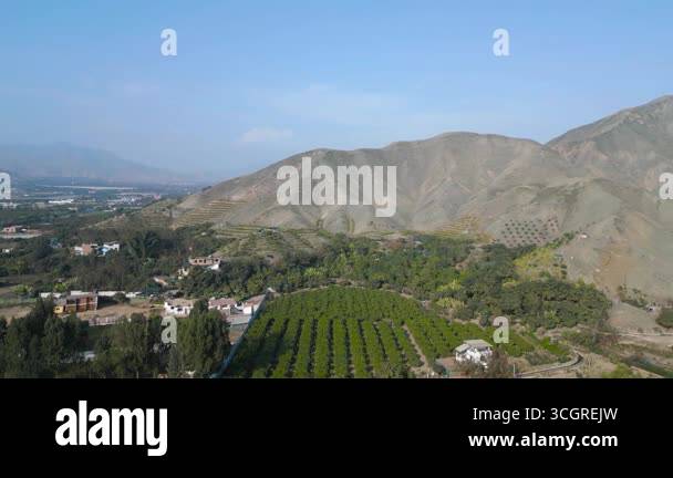 Aerial drone video of lush green landscape and mountains in Huaral ...