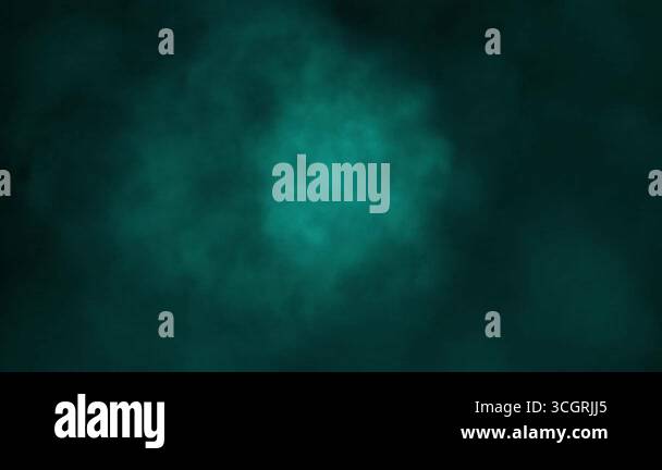 Mysterious teal smoke swirls and drifts, creating an ethereal ...