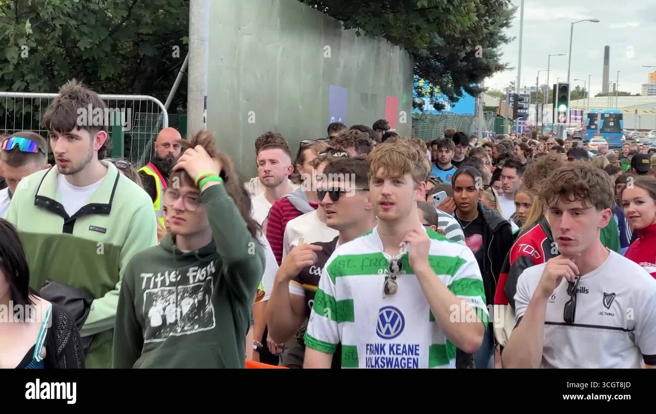 Fans arrive ahead of a Kneecap gig at Belfast Vital Stock Video Footage ...