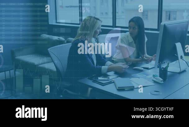 Two women exchanging smartphone gesture at business desk, analyzing ...