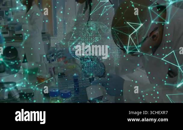 Research scientists initiating pipetting at lab bench while rotating ...