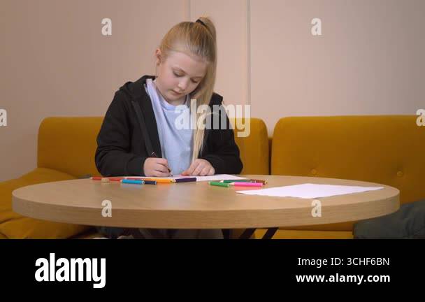 Cute kid drawing with color pencil. Cute little preschooler child ...