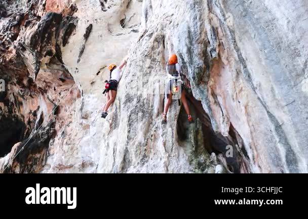 Climber scaling limestone cliffs in Stock Videos & Footage - HD and 4K ...