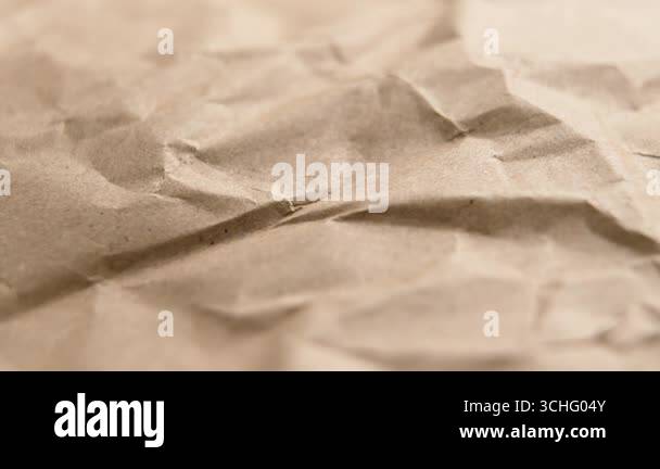 Paper wrinkled used crumpled packing sheet. Front view. Close-up ...