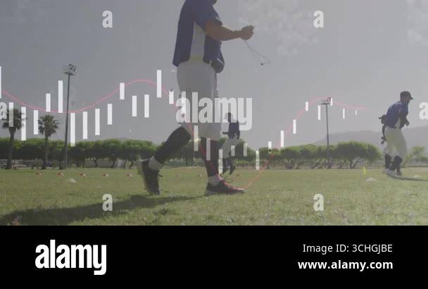 Coach starting baseball drill with stopwatch, athletes running cone ...