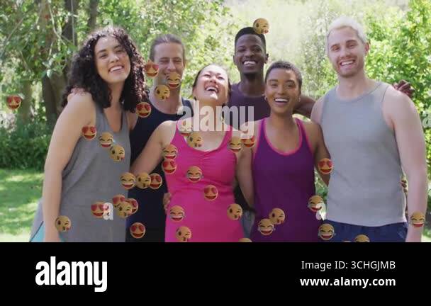 camera recording six friends on lawn showing animated emojis drifting upward for tech showcase ...