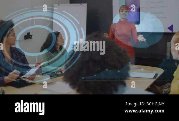 Presenter speaking, gesturing in meeting while team noting and hologram ...