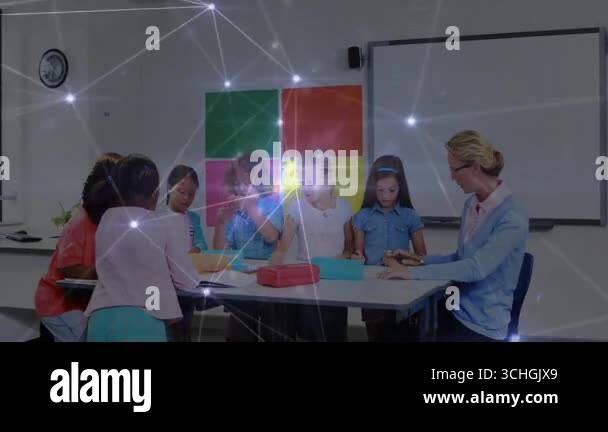 Teacher guiding six students opening pencil cases and drawing in ...