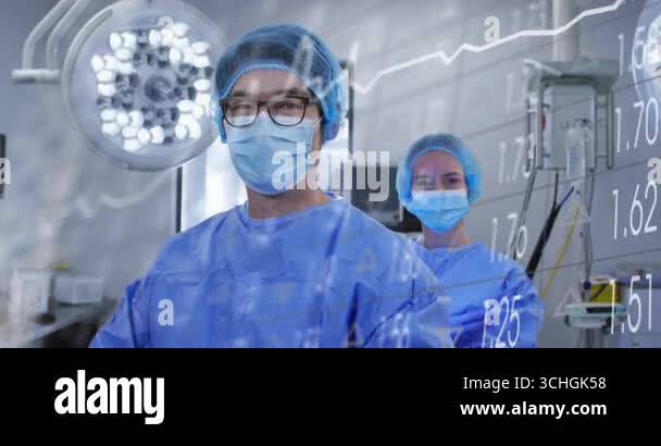 Surgeon and assistant in OR, data overlay appearing and animating ...