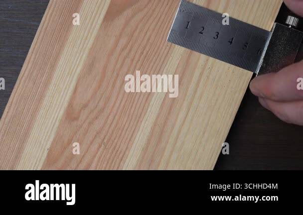Carpenter steel ruler with limit block for marking or template, close ...