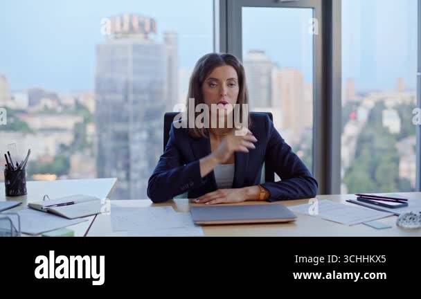 Anxious business lady thinking on project issues sitting modern office ...