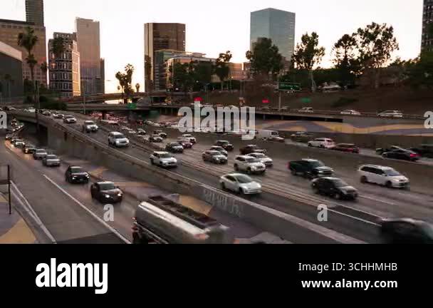 Los Angeles Downtown Sunset Traffic Jam On 110 Freeway Pan R Time Lapse California USA Stock ...