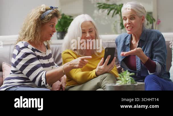 Animation of happy diverse female senior friends using smartphone ...