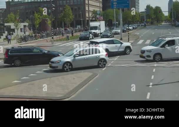 Amsterdam, Netherlands July 29 2025: Dynamic urban traffic footage ...