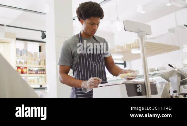 Animation of focused waiter weighting cheese. coffee and bistro shop ...