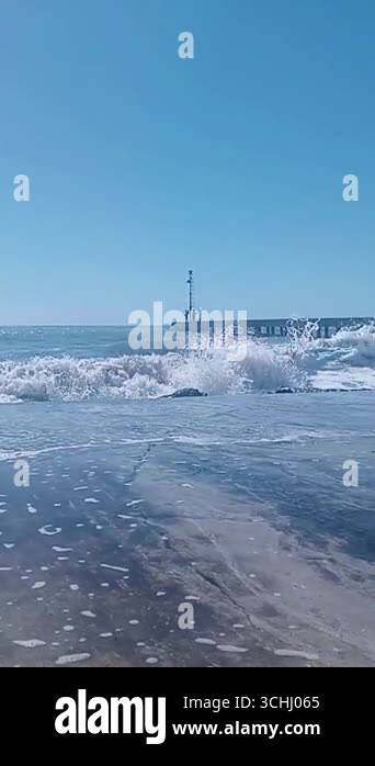 Storm surge on the pier - Waves crashing Stock Video Footage - Alamy