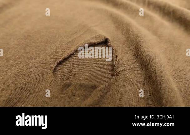brown cloth torn and damaged with holes. texture effect Stock Video ...