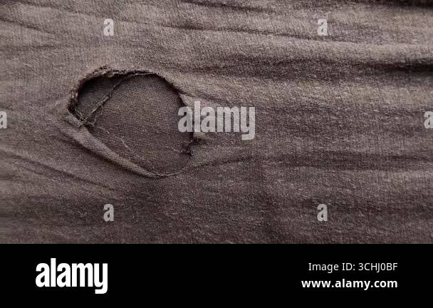 brown cloth torn and damaged with holes. texture effect Stock Video ...