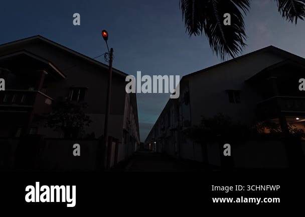 night hour scene of the lighting up the residential street Stock Video ...