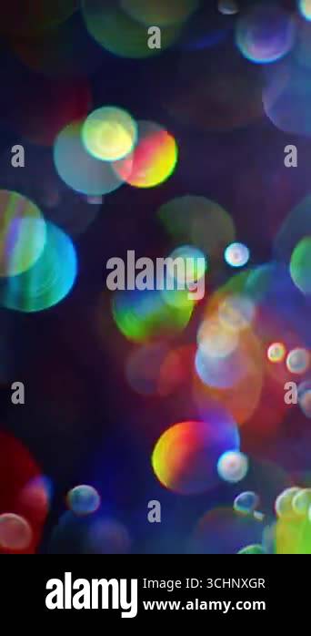 Vibrant rainbow of sparkling glitter creating glowing bokeh of lights ...