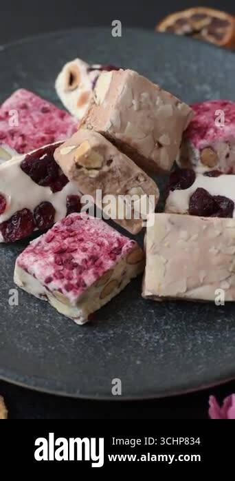 Nougat or white caramel with hazelnuts and pistachios and strawberry ...