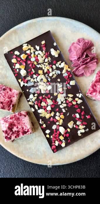 Bar sweet craft artisan chocolate with dried fruits made at home. Craft ...