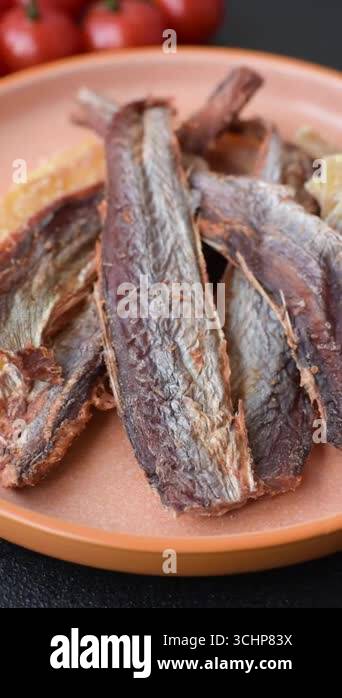 Dried salted fish as snacks or jerky, seafood as slices. Dried seafood ...