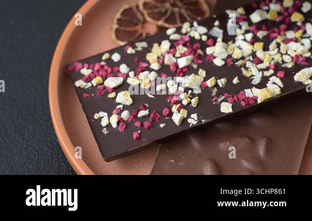 Bar sweet craft artisan chocolate with dried fruits made at home. Craft ...