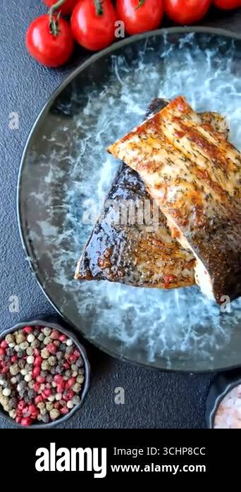 Food, seafood, grilled fish fillet with lemon, salt and spices. Grilled ...