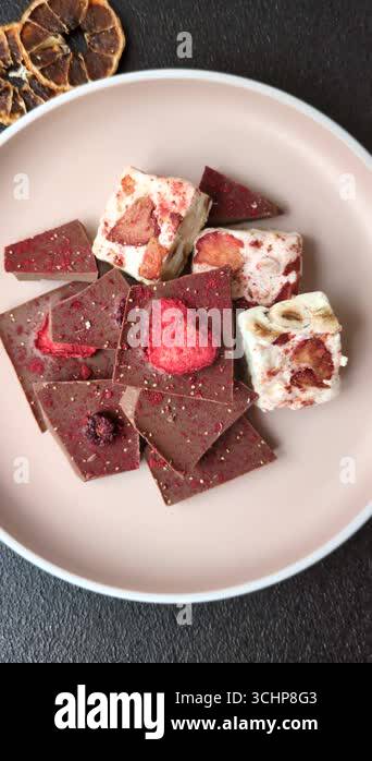 Bar sweet craft artisan chocolate with dried fruits made at home. Craft ...