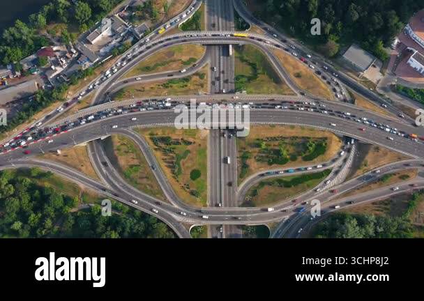 Roadways with traffic jam and moderate car traffic. Aerial top view ...