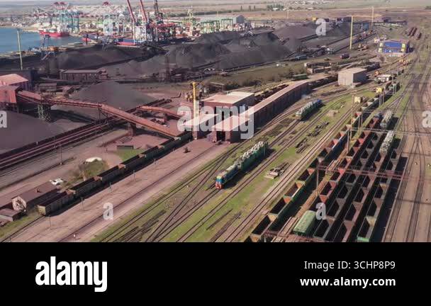 Cargo trains in the sea port depot. Aerial drone view Stock Video ...