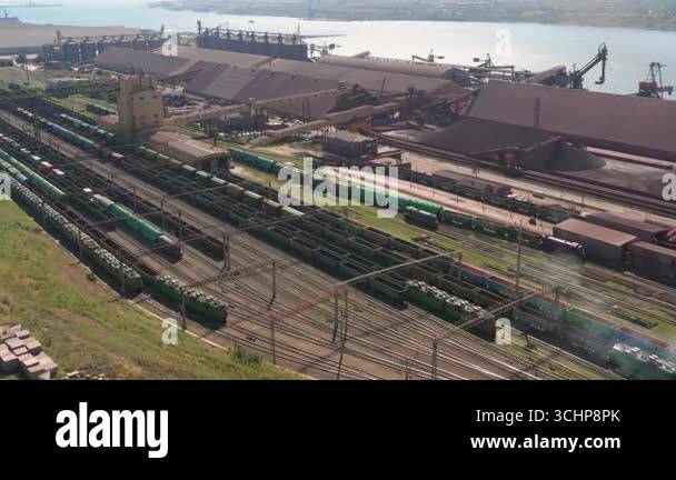 Top view of railway depot in a sea port. Moving cargo train Stock Video ...