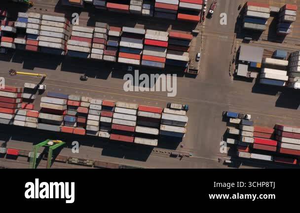 Colorful rectangle cargo containers ready for shipping. Aerial top view ...