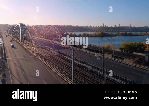 Aerial panoramic view of highway bridge road over the river. City ...