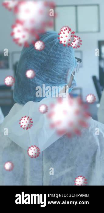 Covid-19 cells floating against team of health workers discussing ...