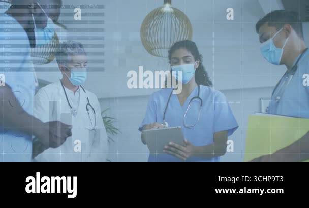 Nurse tapping tablet and initiating chart overlays while team reviewing ...