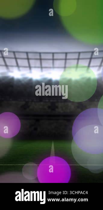 Animation of failing spots and glowing lights over football stadium ...