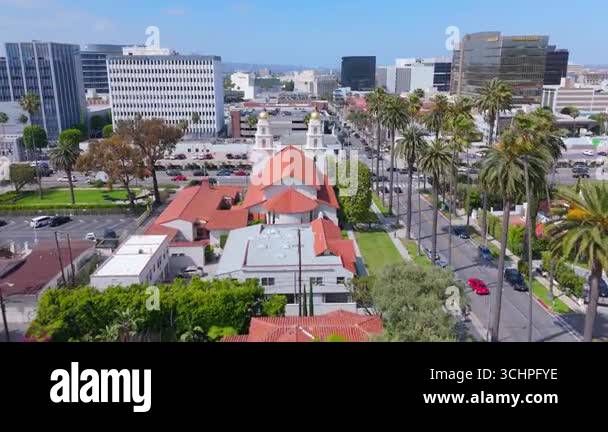 Forward-moving aerial drone footage over All Saints Episcopal Church ...