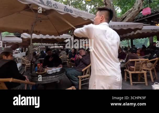 Chengdu, China-11 October, 2024: traditional tea pouring performance ...