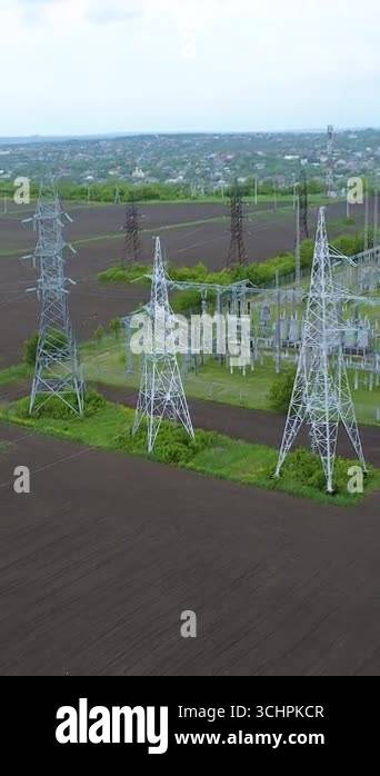 Aerial view of electrical infrastructure featuring transmission towers ...