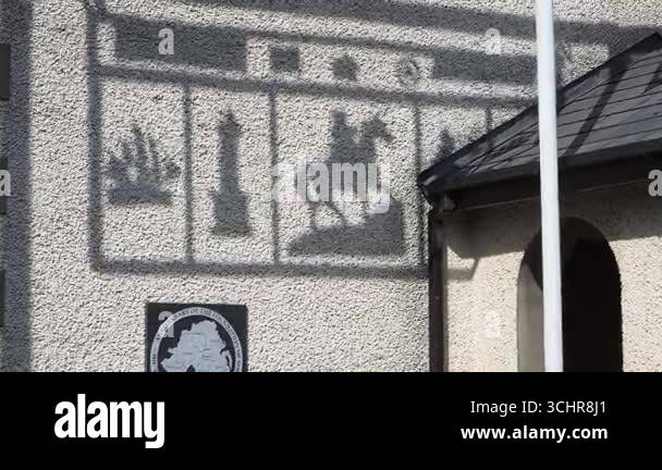 Bushmills, Northern Ireland - Aug 18th, 2025: Shadows of symbols from ...