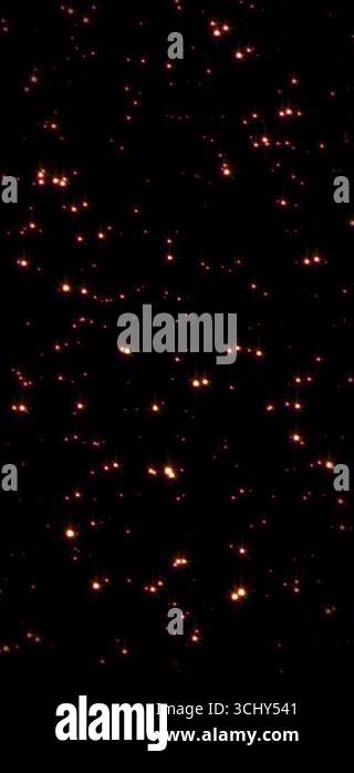 Shining particles floating. Loop. 4K Vertical Stock Video Footage - Alamy