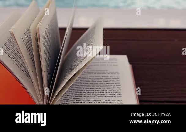 An open book with fanned-out pages, inviting the reader to dive in ...