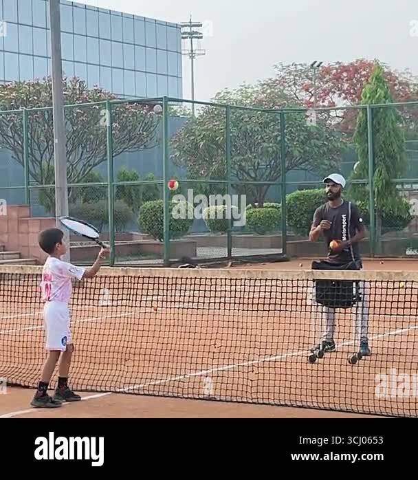 Delhi, India, February 17, 2025 - Junior tennis players having coaching ...