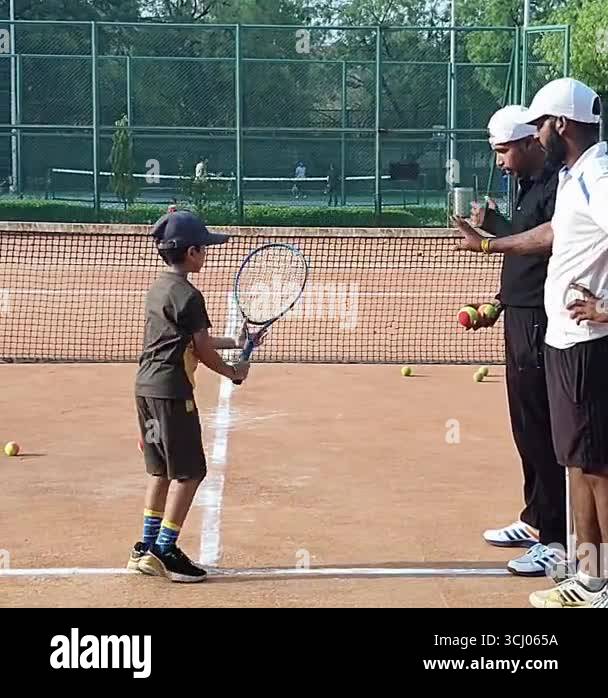 Delhi, India, February 17, 2025 - Junior tennis players having coaching ...