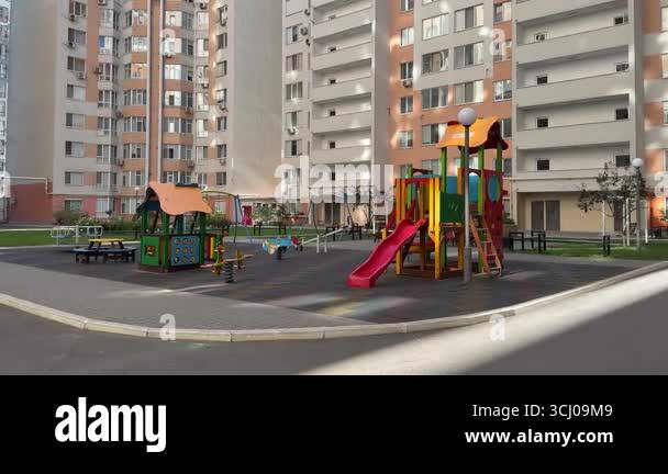 A modern residential complex of multi-family apartment buildings with a ...