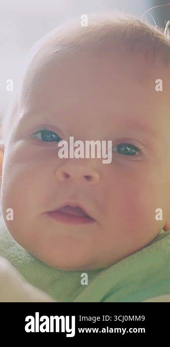A cute and adorable baby with captivating big eyes and an incredibly ...