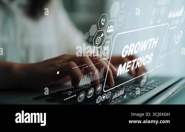 Close-Up of Hands Typing on Laptop with Growth Metrics Visual Overlays for Business Analysis and ...